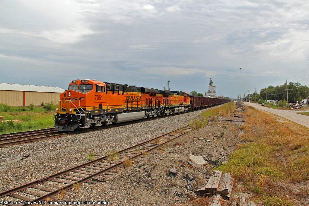 BNSF 7051 is brand new c4 leading a loaded coal train nb.